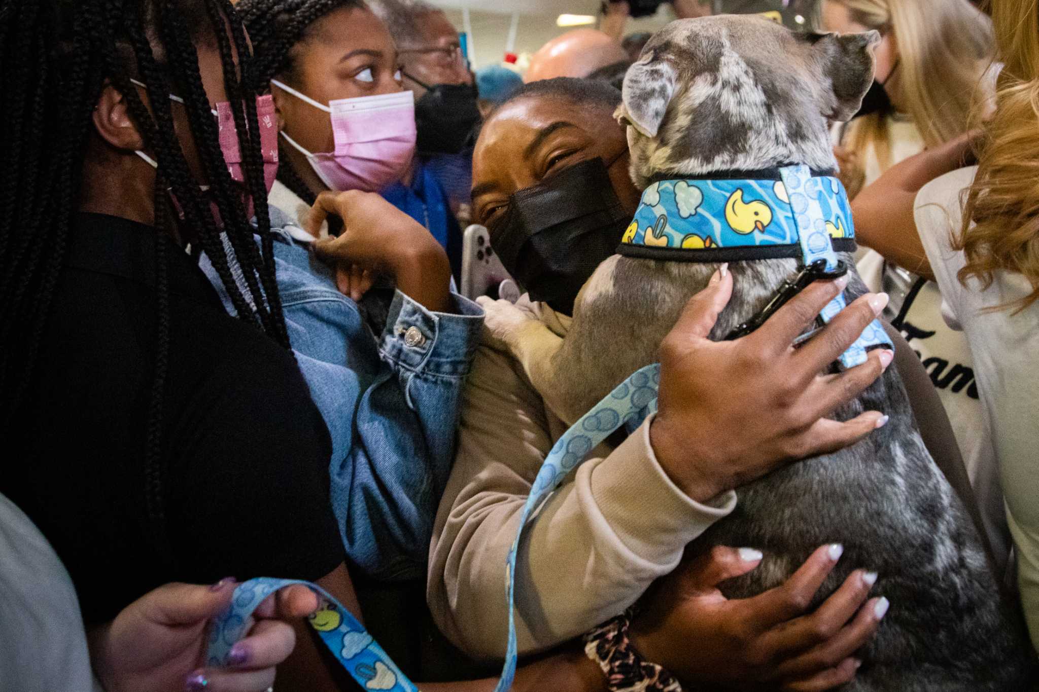 How Houston and her French bulldog welcomed Simone Biles home from Olympics