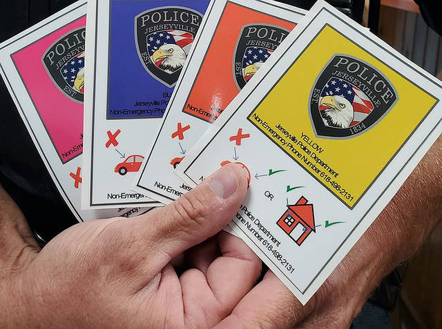 Police hope color-coded stickers can overcome communication barriers