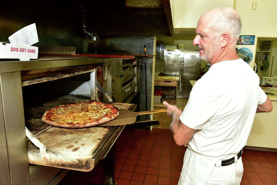 New Haven pizza lovers say there s something magical that happens in Ernie s