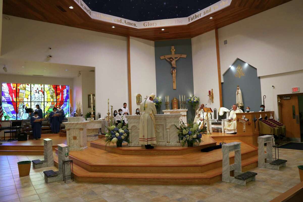 Wilton’s Our Lady of Fatima unveils new altar and crucifix to congregation
