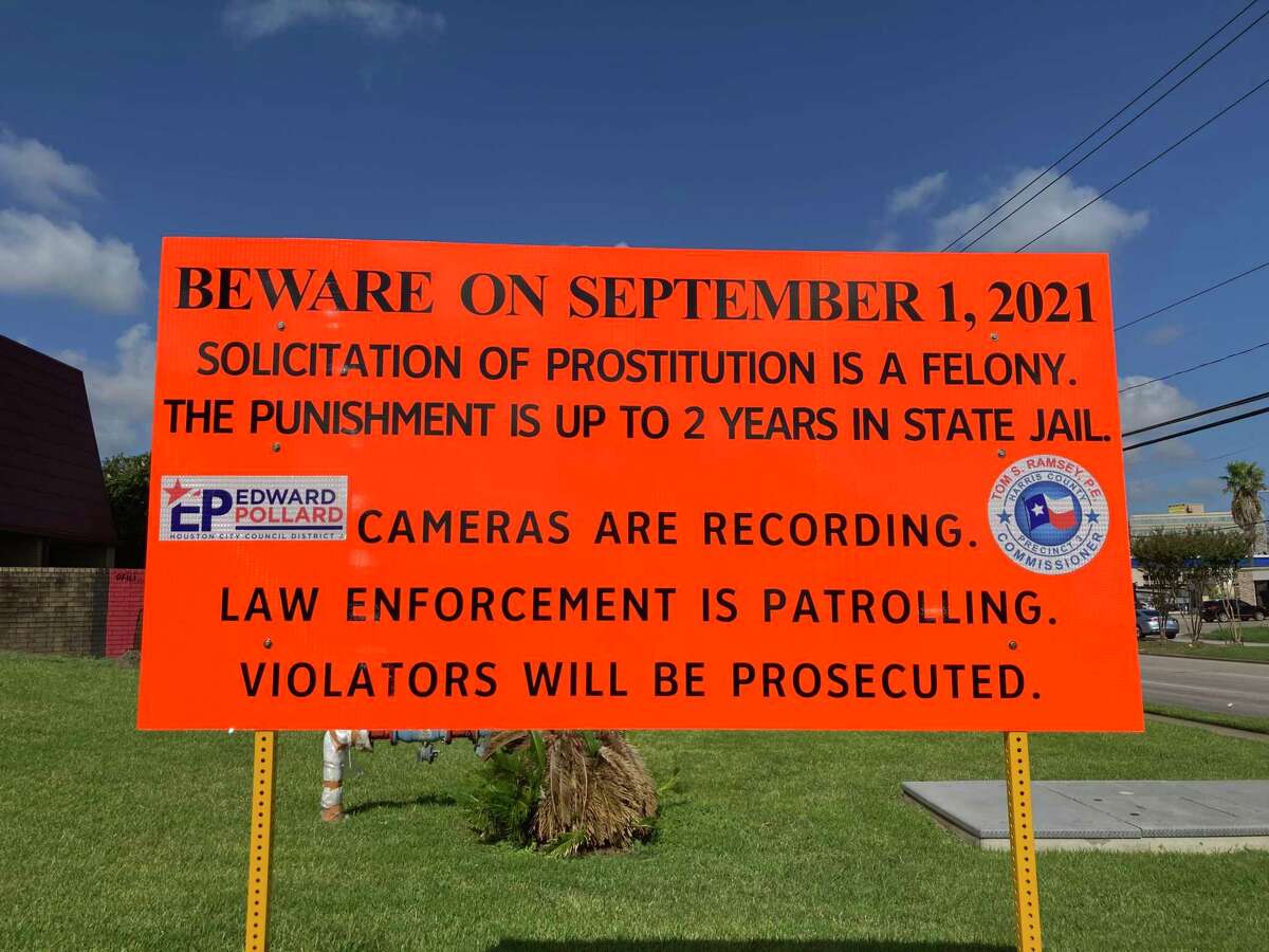 New bright-orange signs up along Bissonnet Track in latest attempt to ...