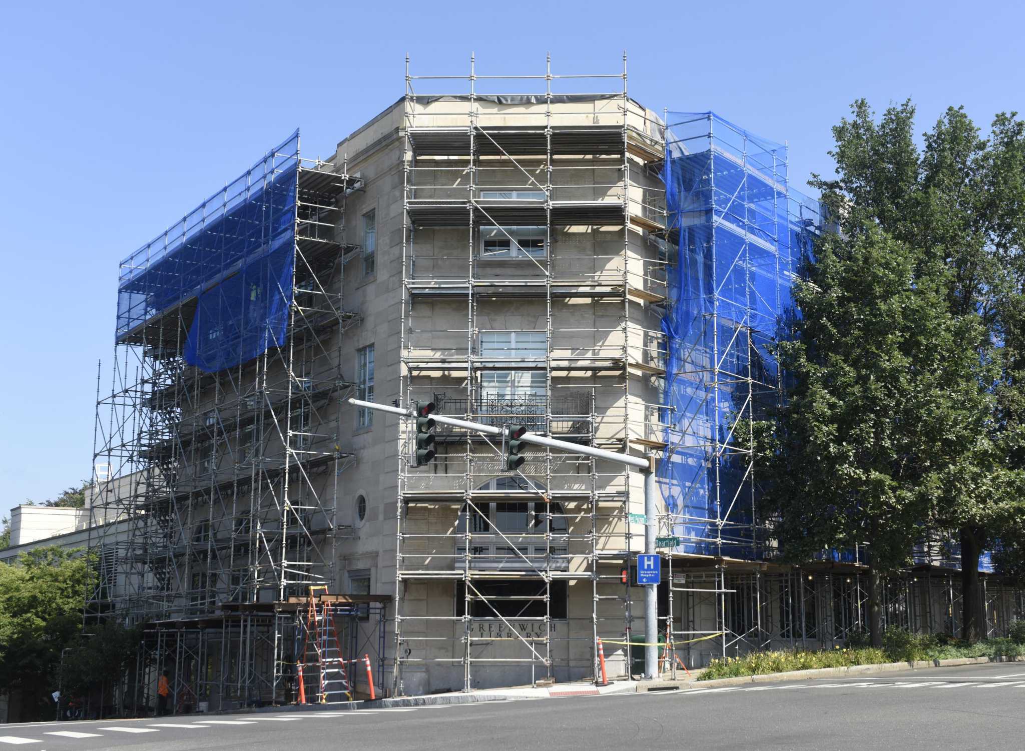 In photos: Another chapter of work on the facade at the Greenwich Library