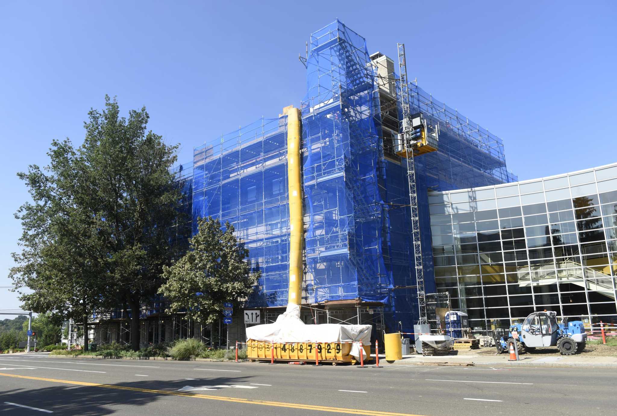 In photos: Another chapter of work on the facade at the Greenwich Library