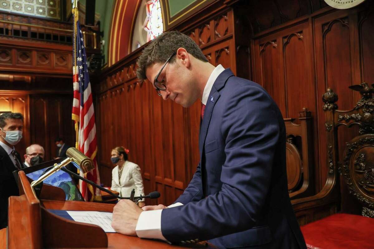 Republican Ryan Fazio takes the oath of office as a new state senator