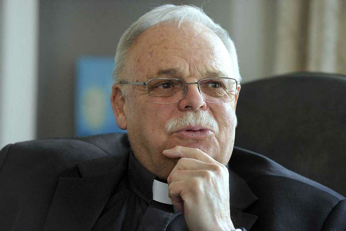 Unwilling to retire at 75, a Newtown priest gets an extension to mark ...