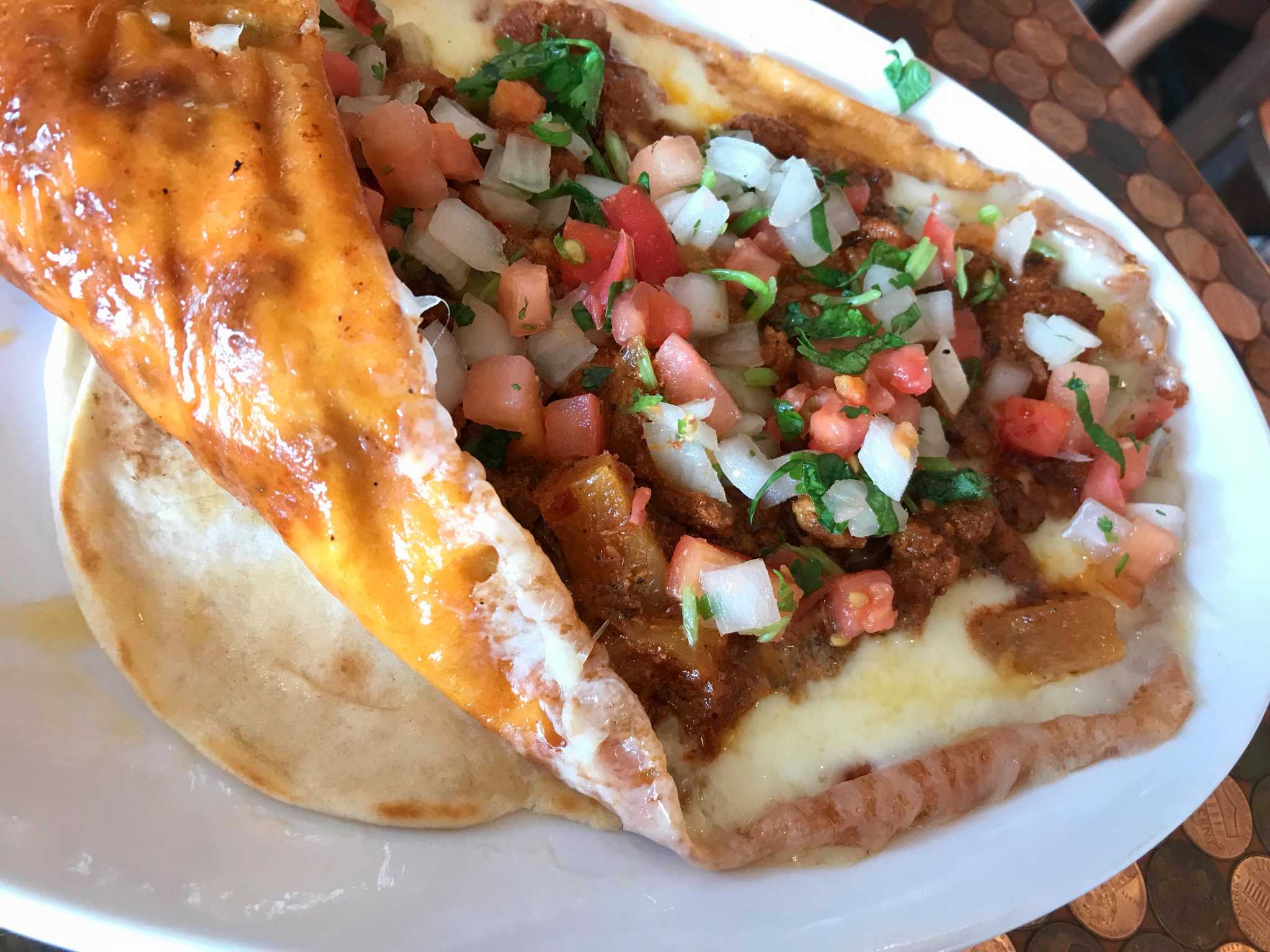 The costra taco at San Antonio’s Chela’s Tacos doesn’t actually replace ...