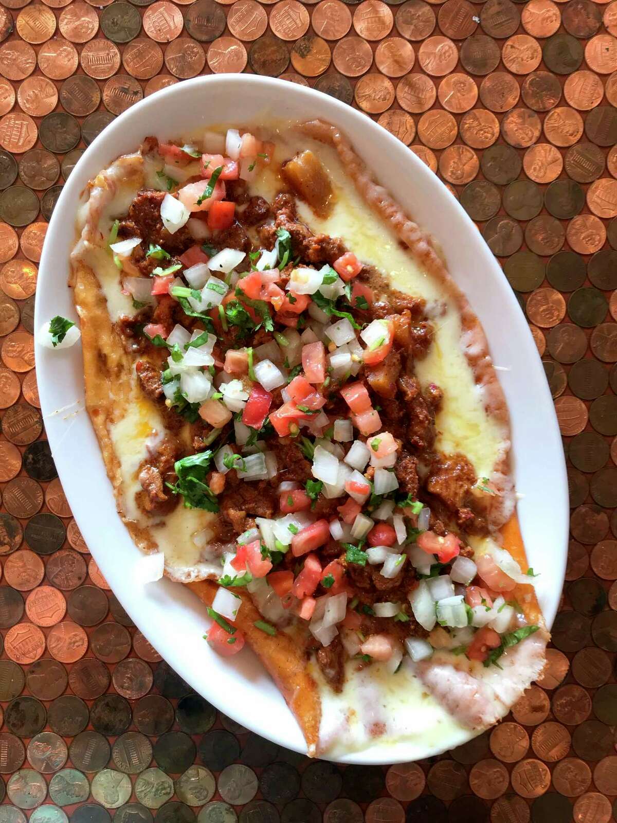 The costra taco at San Antonio’s Chela’s Tacos doesn’t actually replace ...