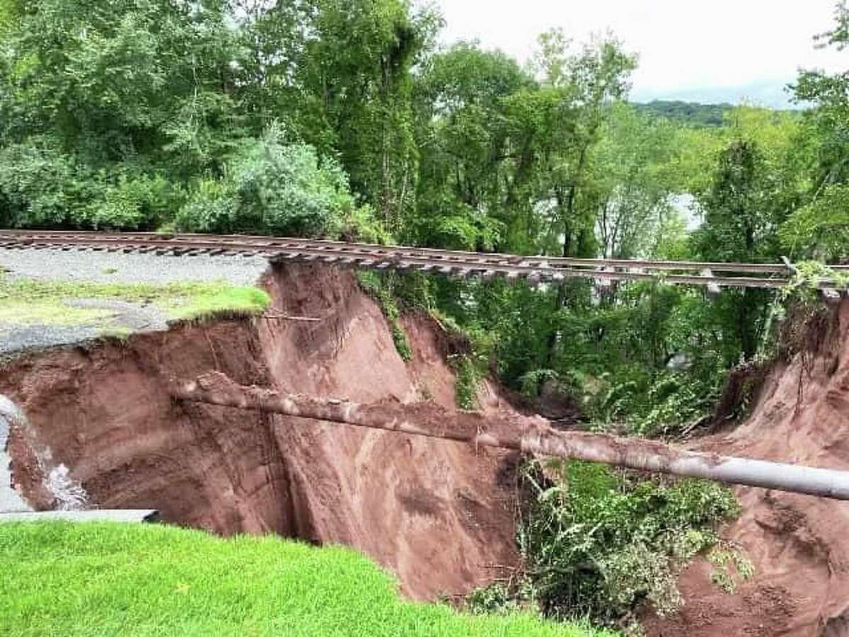 Sinkhole suspends train tracks in air at PGA Tour golf course in Cromwell