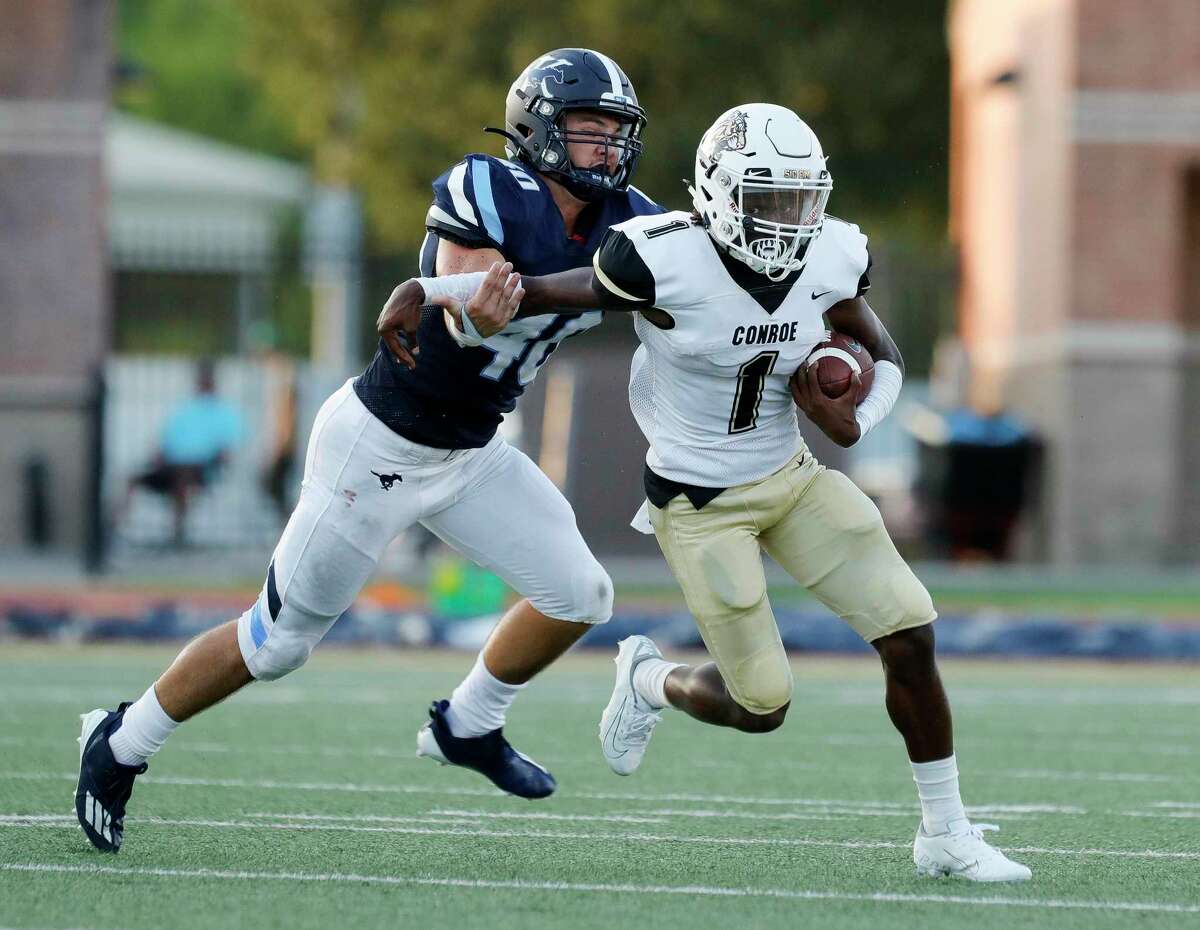 FOOTBALL: Conroe rolls to first shutout since 2007 at Kingwood