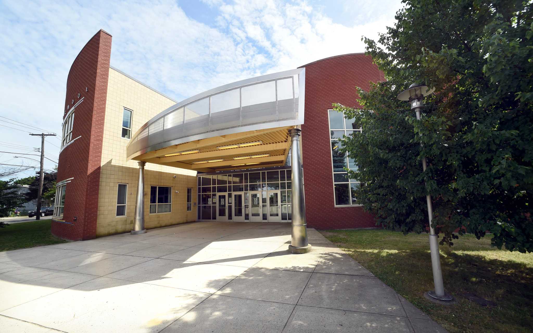 ICE agents waited near a New Haven school. A father took refuge inside