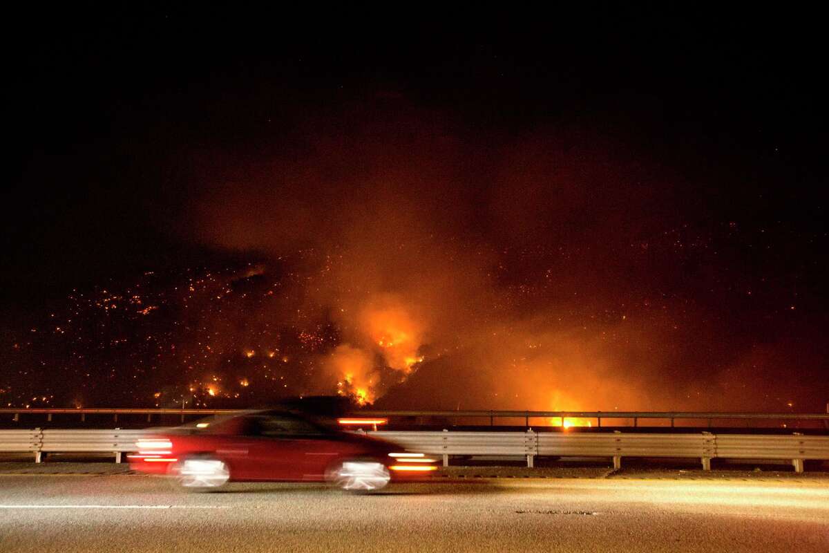 Dramatic photos show Route Fire burning on both sides of Interstate 5