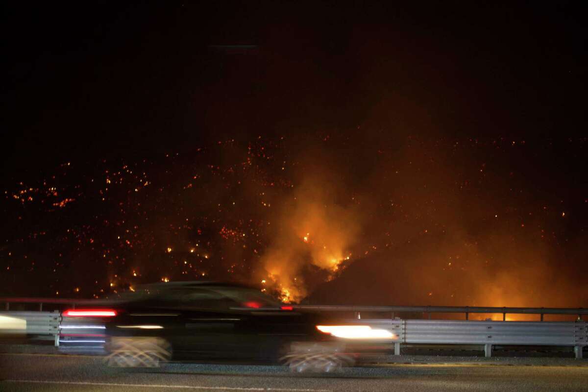 Dramatic photos show Route Fire burning on both sides of Interstate 5