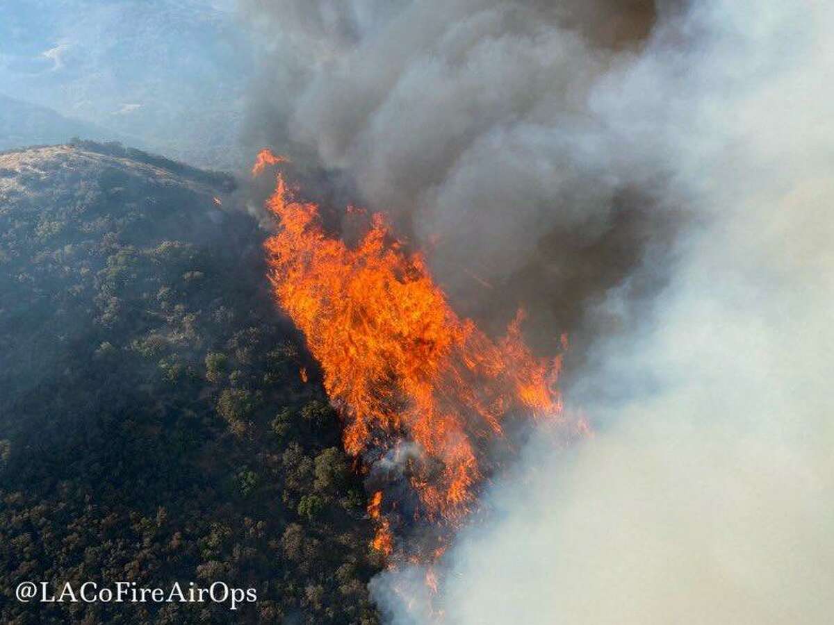 Dramatic photos show Route Fire burning on both sides of Interstate 5