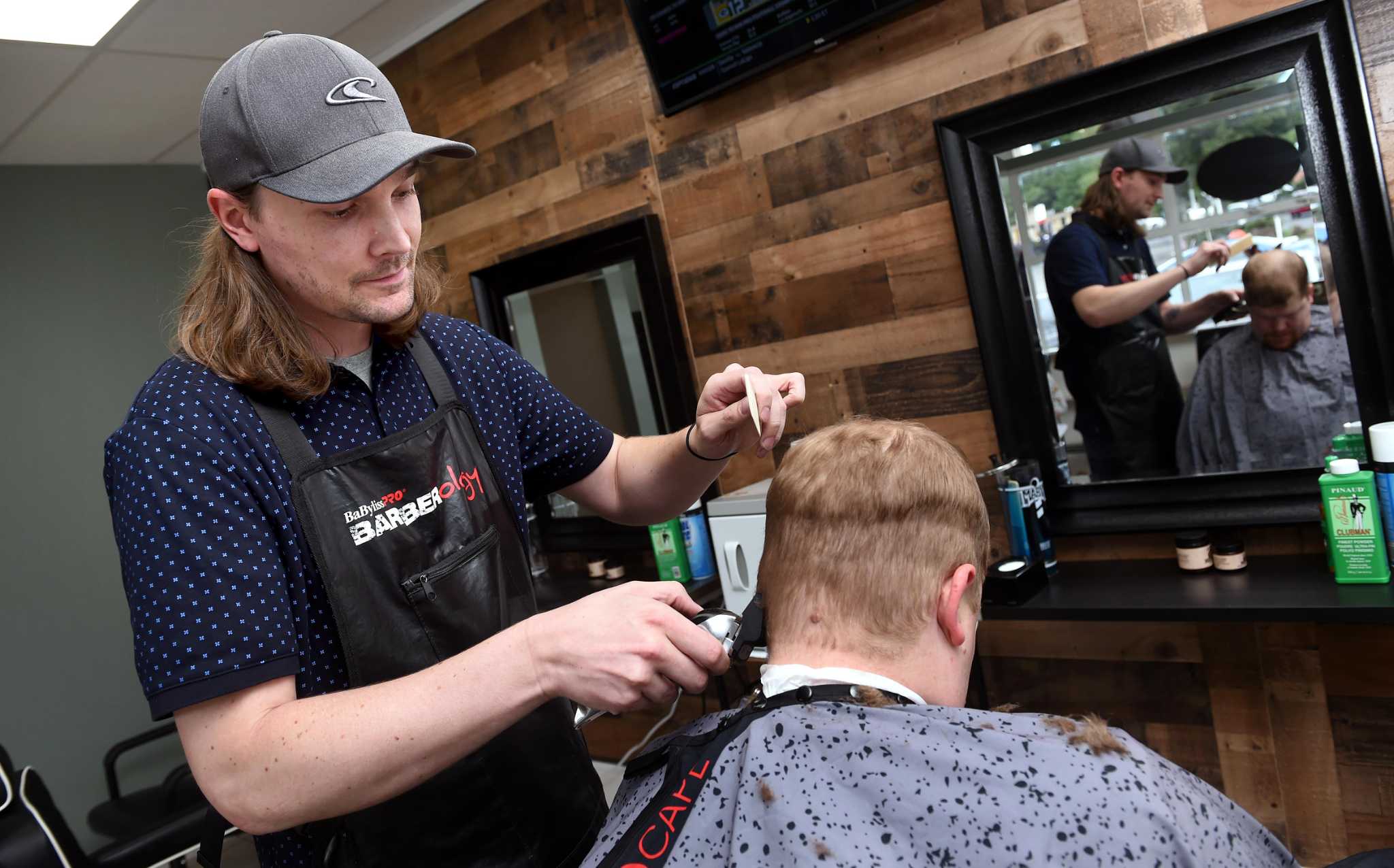 Clients say owner of Orange barber shop is a shear pro; it’s like ...