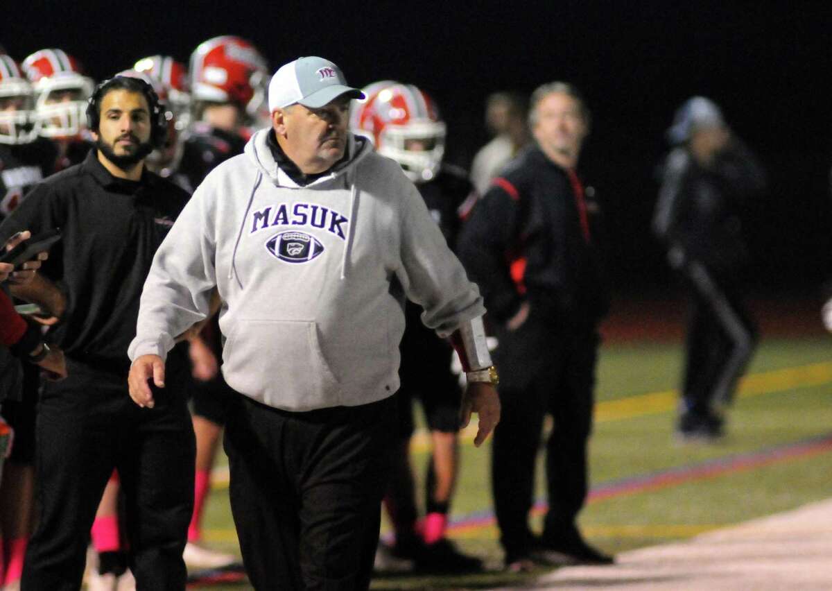 Masuk parents, alumni defend Steve Christy at board meeting