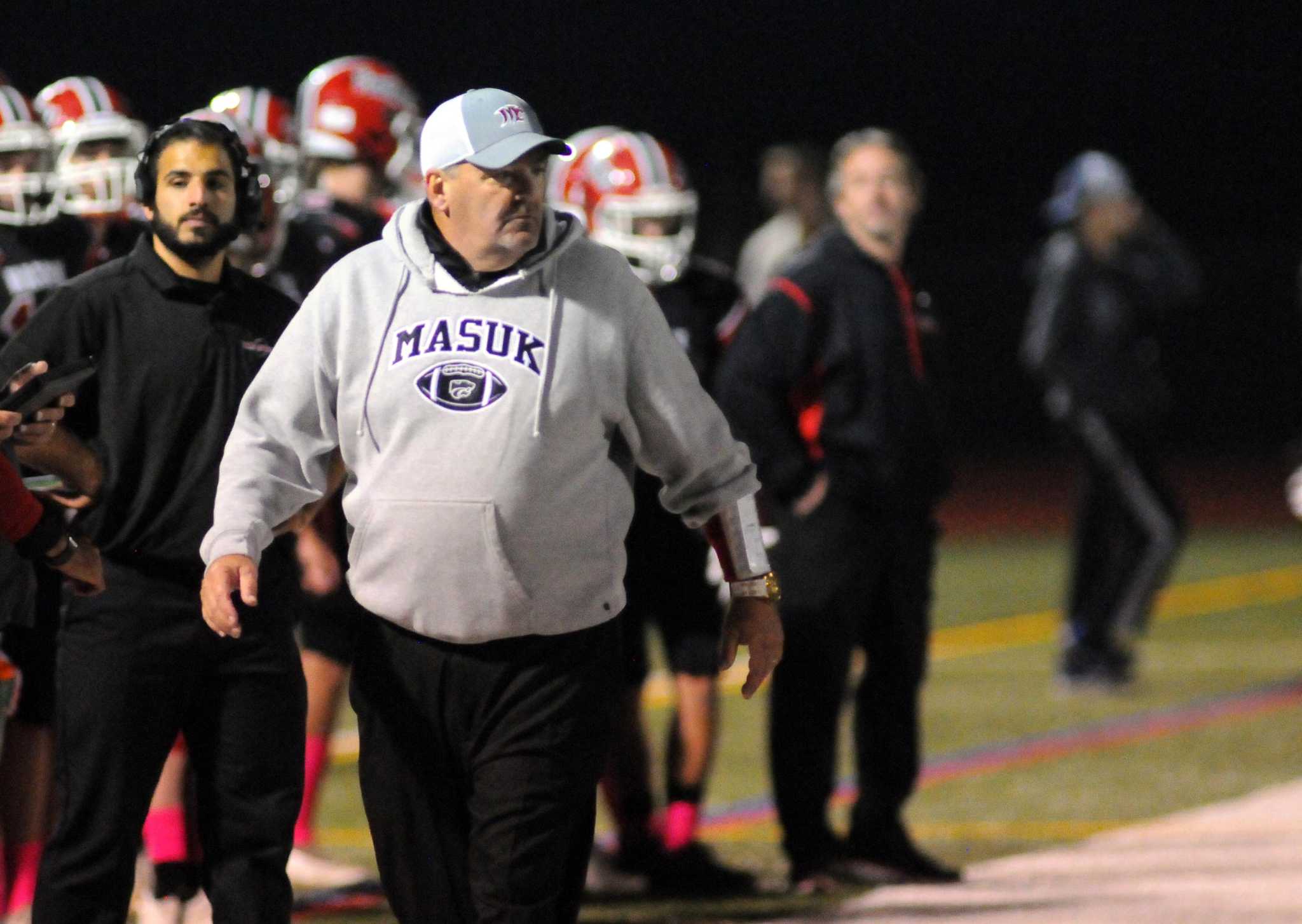 Masuk parents, alumni defend Steve Christy at board meeting