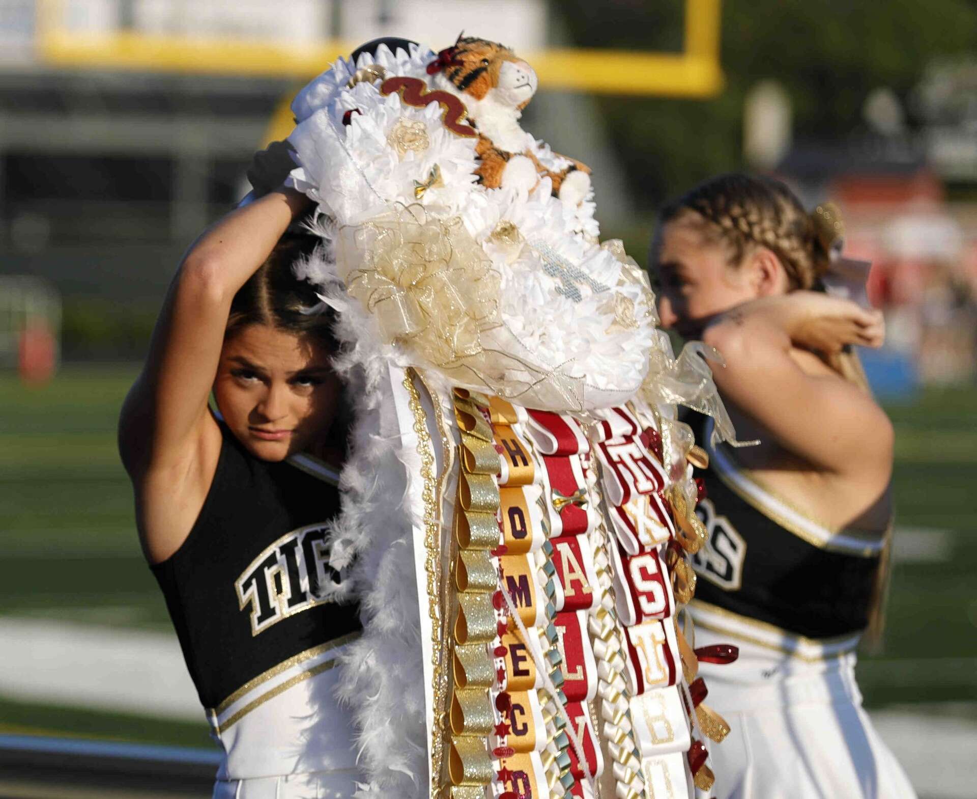 How did mums become a Texas homecoming tradition?