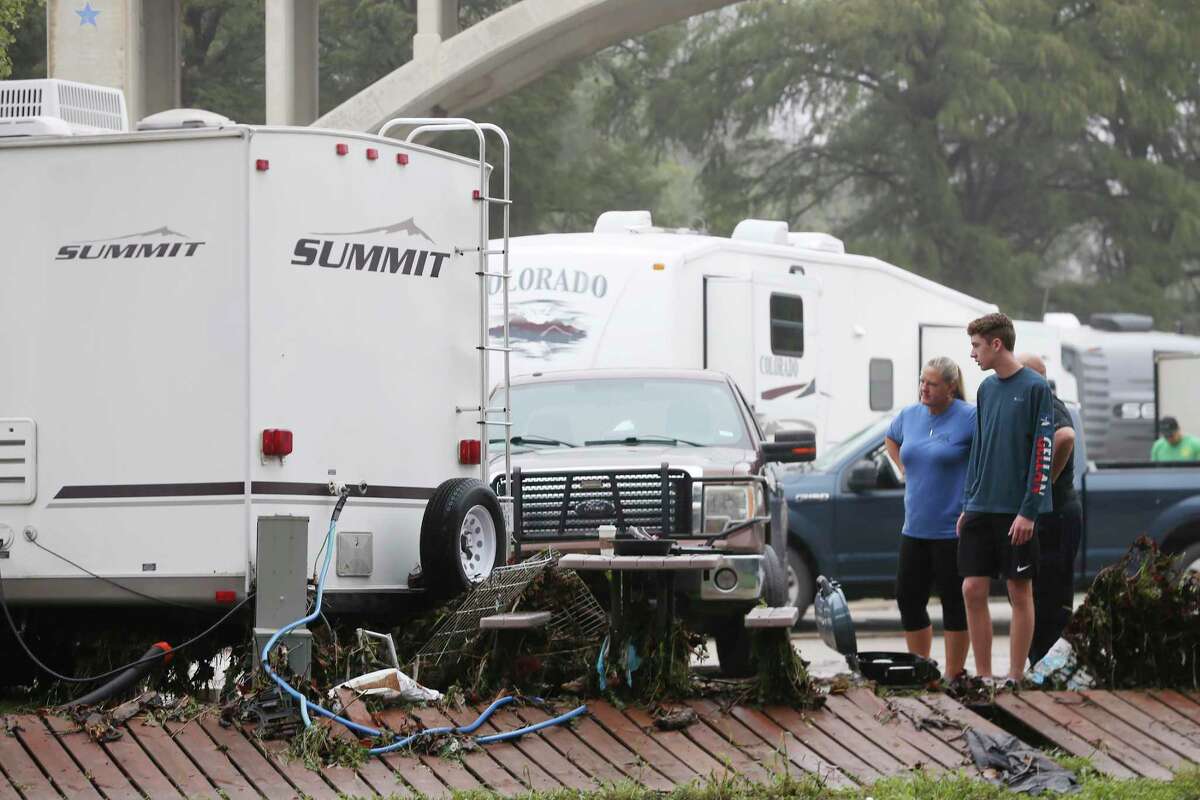 Woman, child found dead after being swept away by flooding on Far East Side