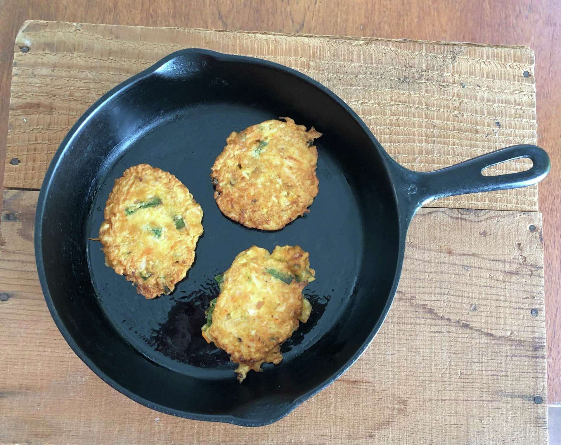 Got leftover rice? Fold it into these crispy fritters, inspired by ...