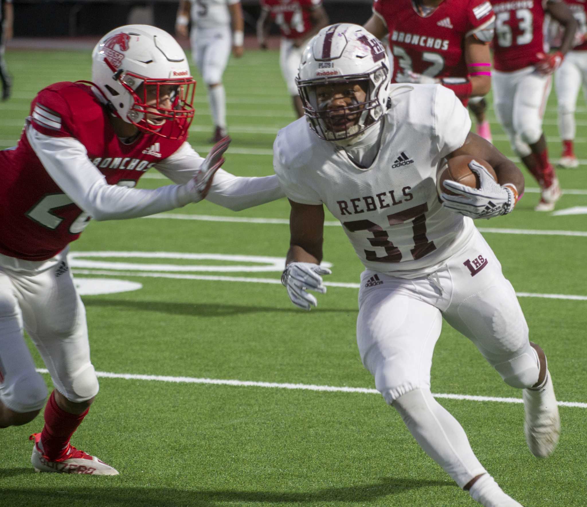 HS FOOTBALL: Rebels claim share of district title