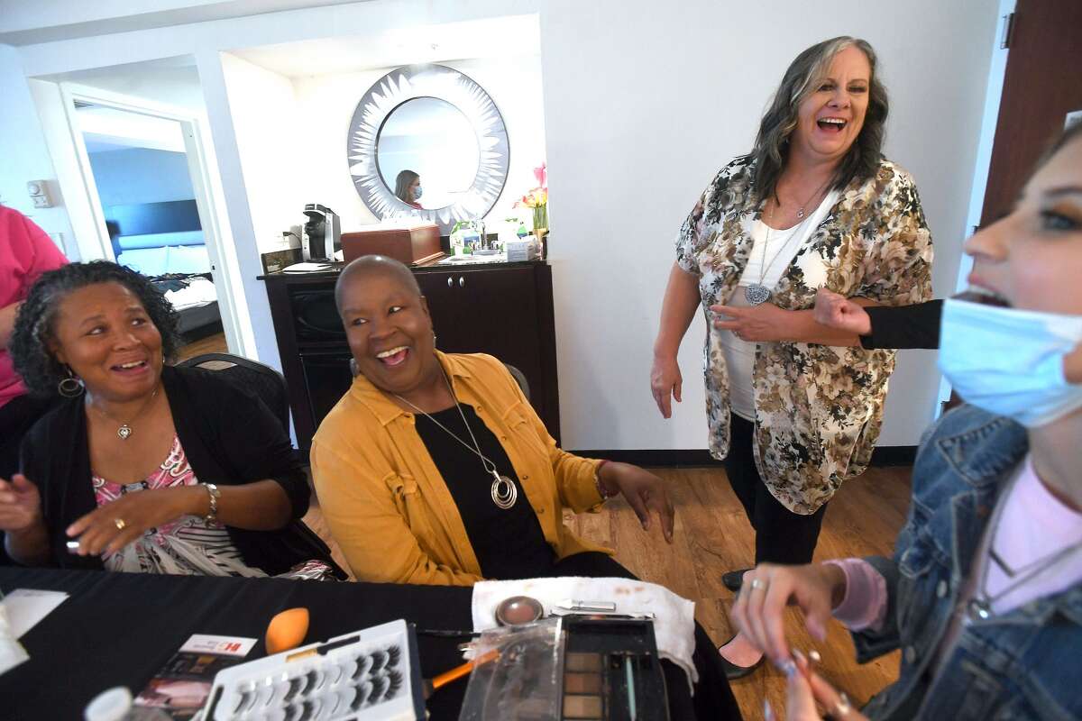 Sabine River Authority administrative assistant works to check off ...