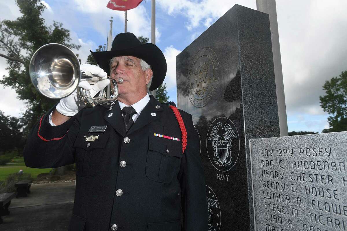 Beaumont bugler pays respects with taps
