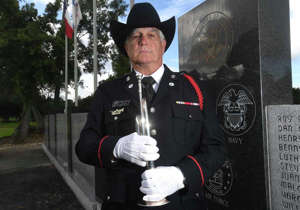 Beaumont bugler pays respects with taps