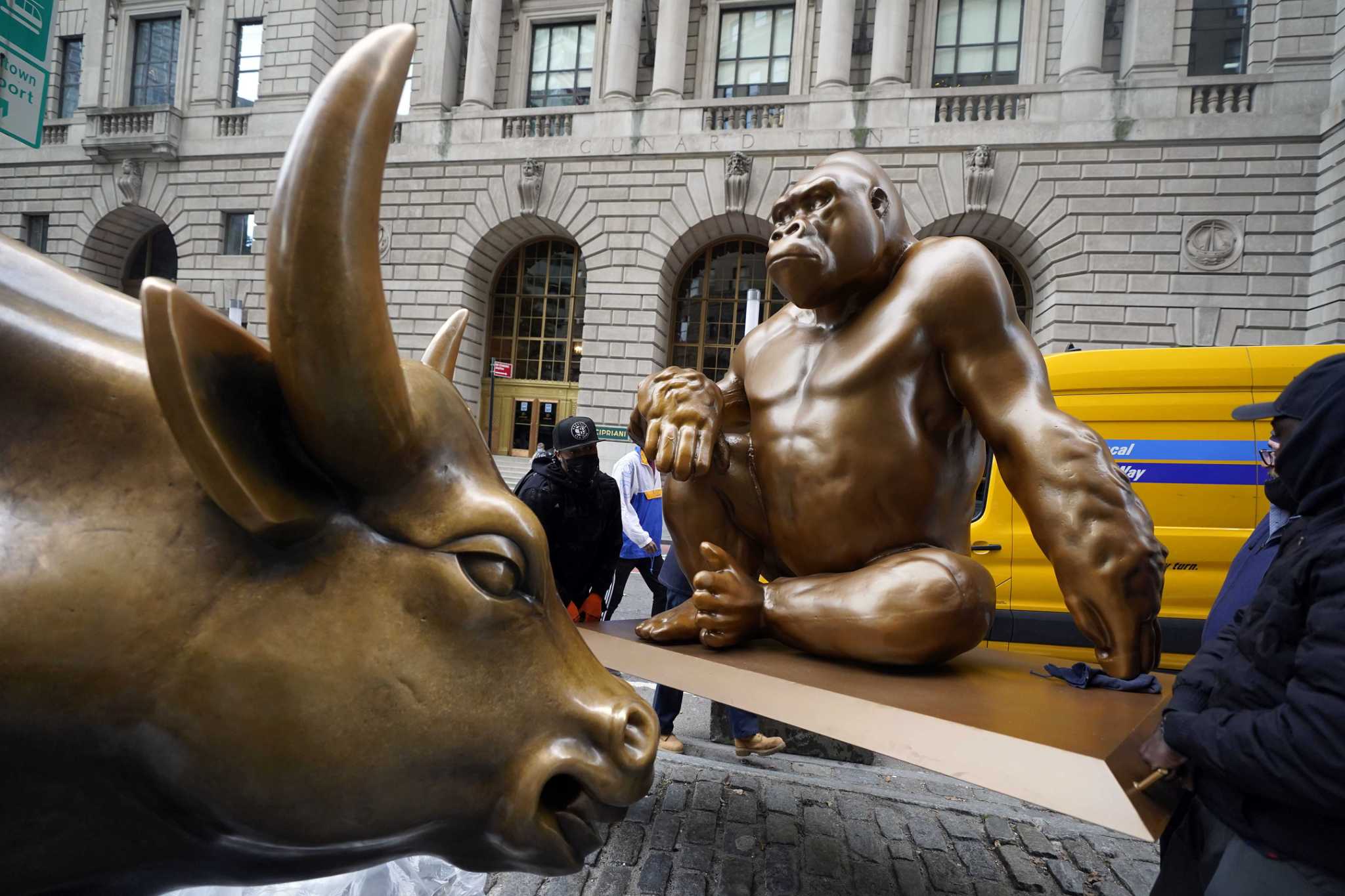 Statue of Harambe appears on Wall Street across from Charging Bull ...