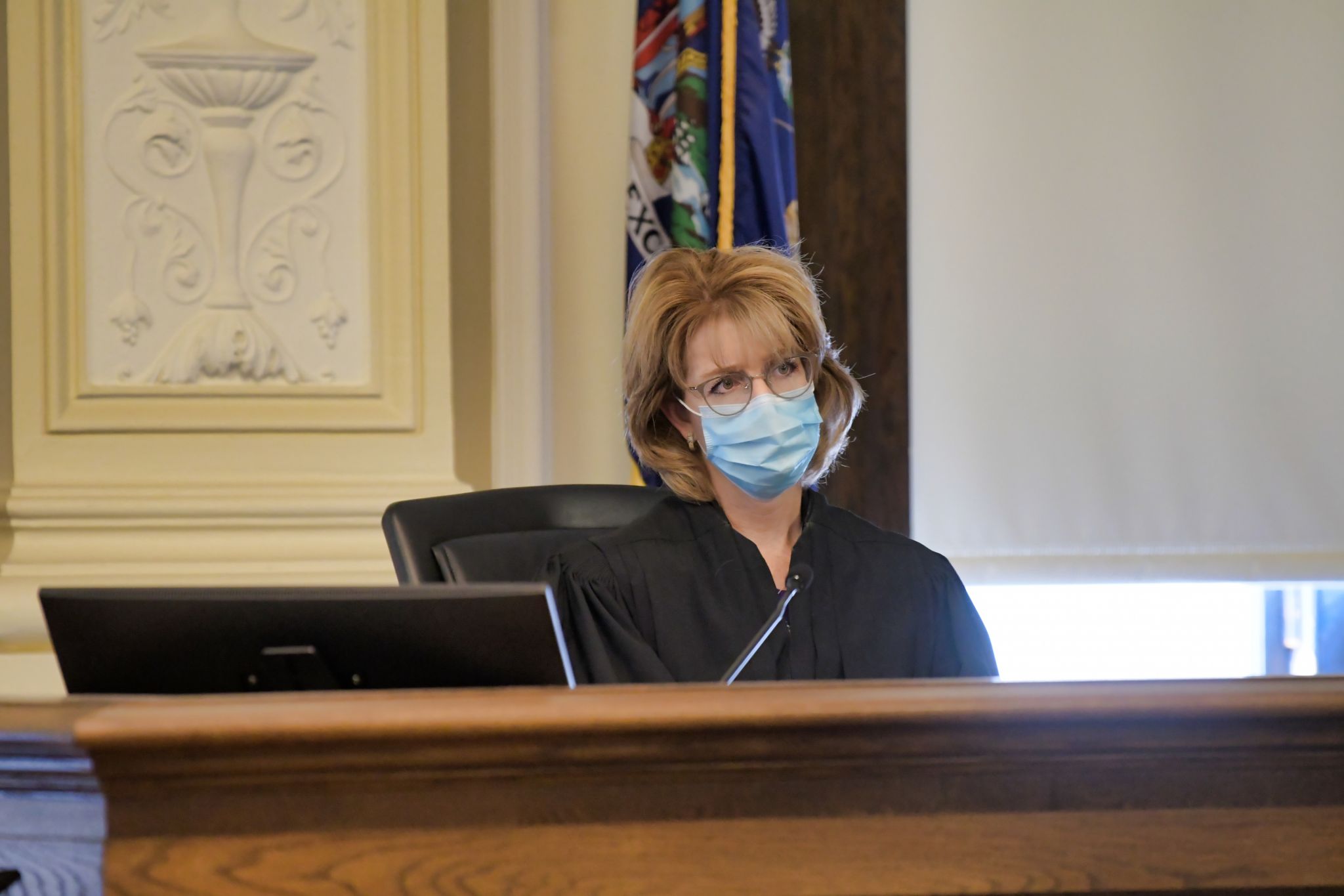 Murder defendant questions medical examiner over victim's skin color
