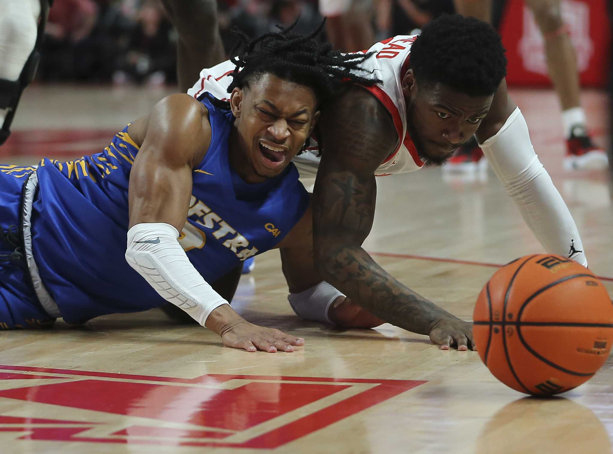 UH basketball rallies past Hofstra to take season opener in OT