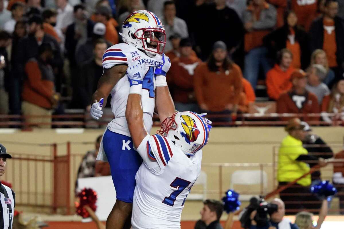 Texas' freefall continues with OT loss to Kansas