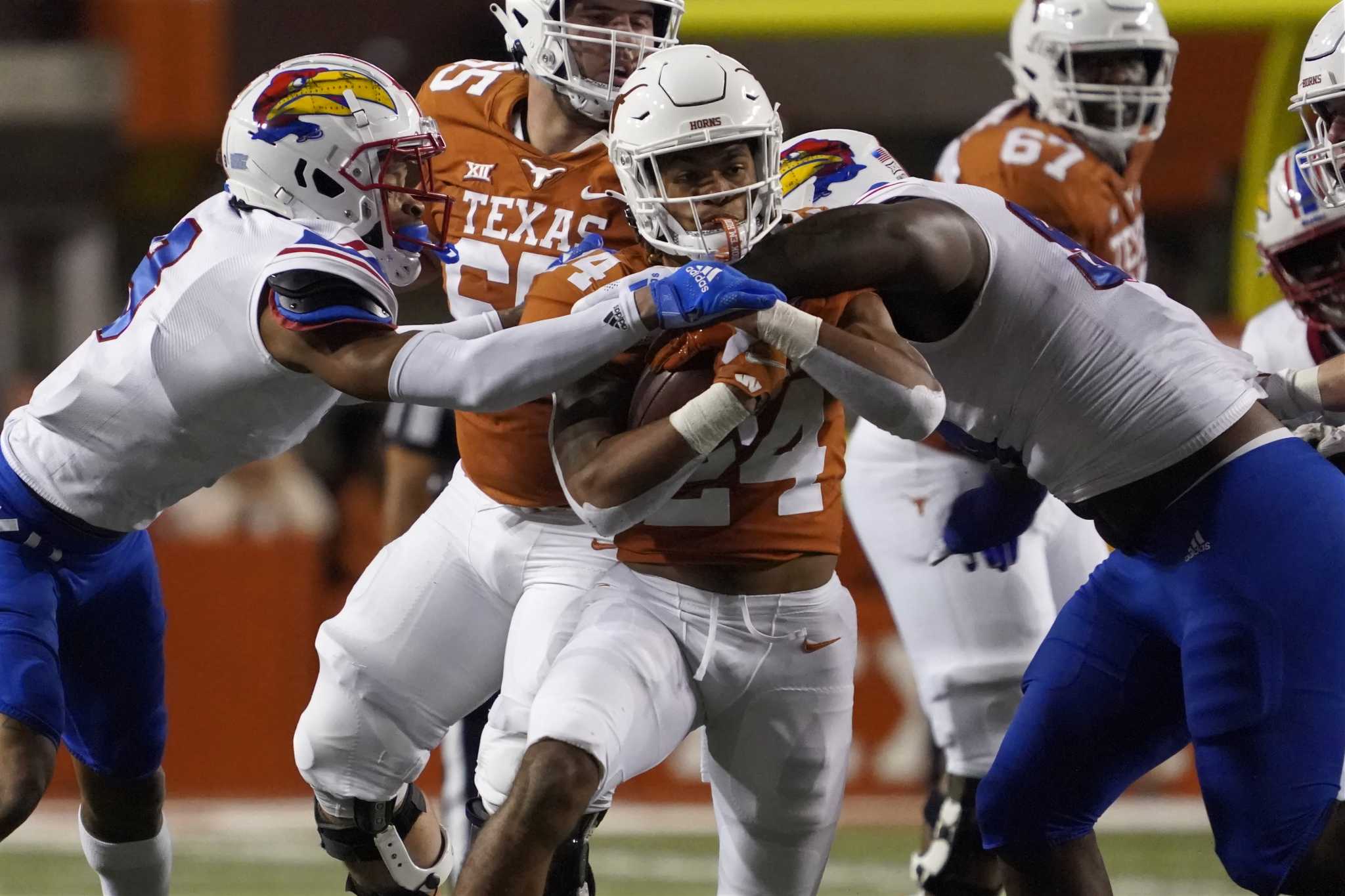 Texas' freefall continues with OT loss to Kansas
