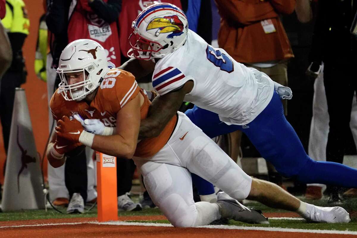 Texas' freefall continues with OT loss to Kansas
