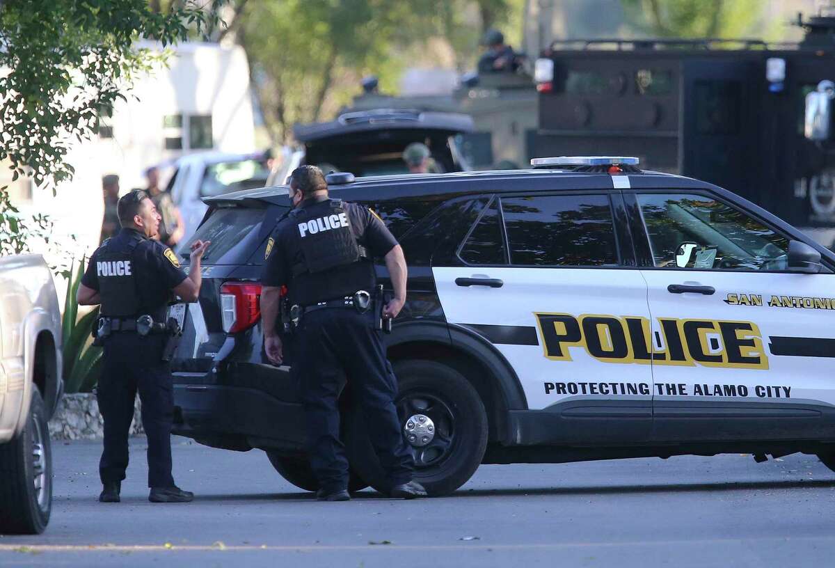 Man arrested on murder charge after hours-long standoff with police