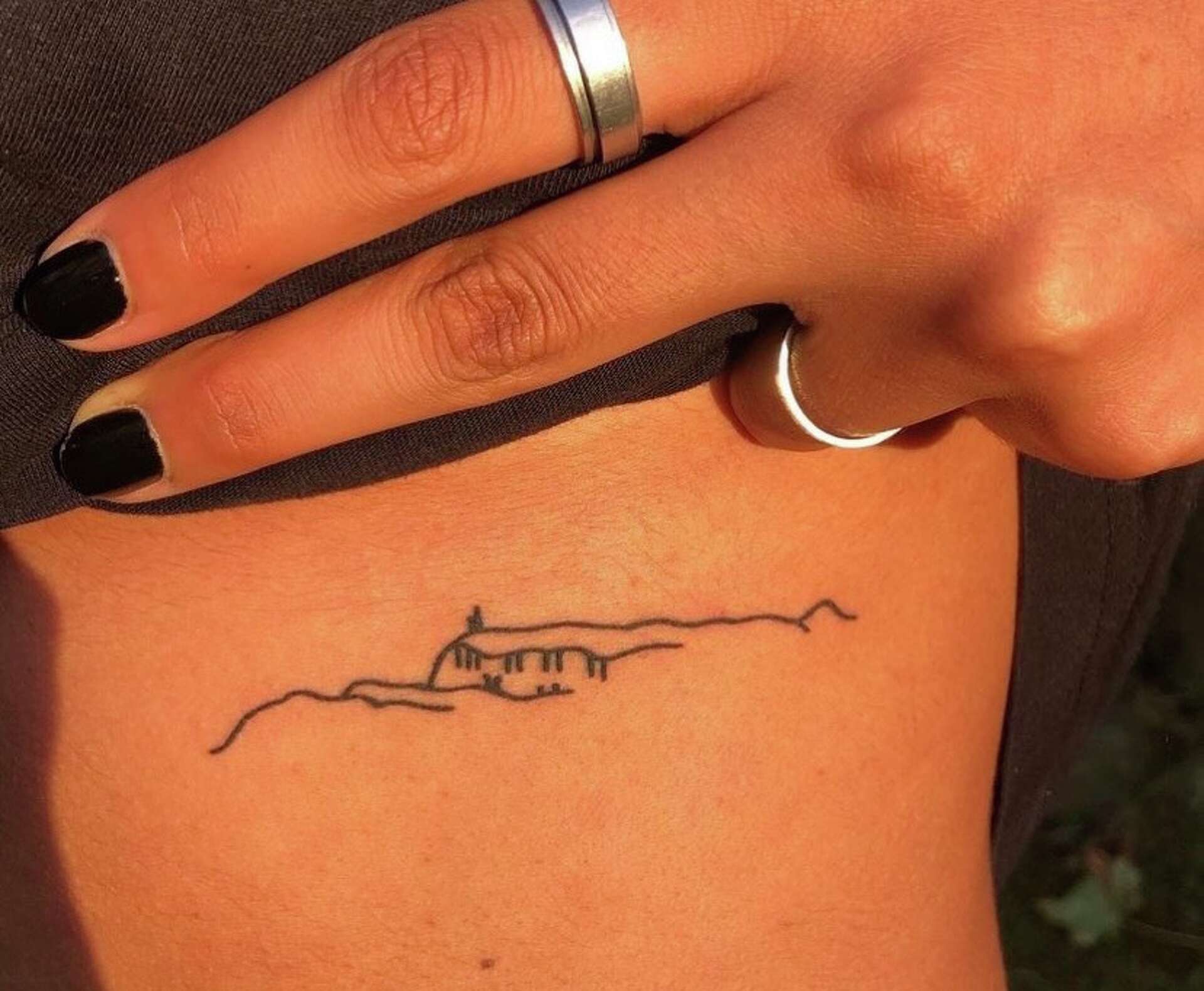 Top college memento? A tattoo, of course