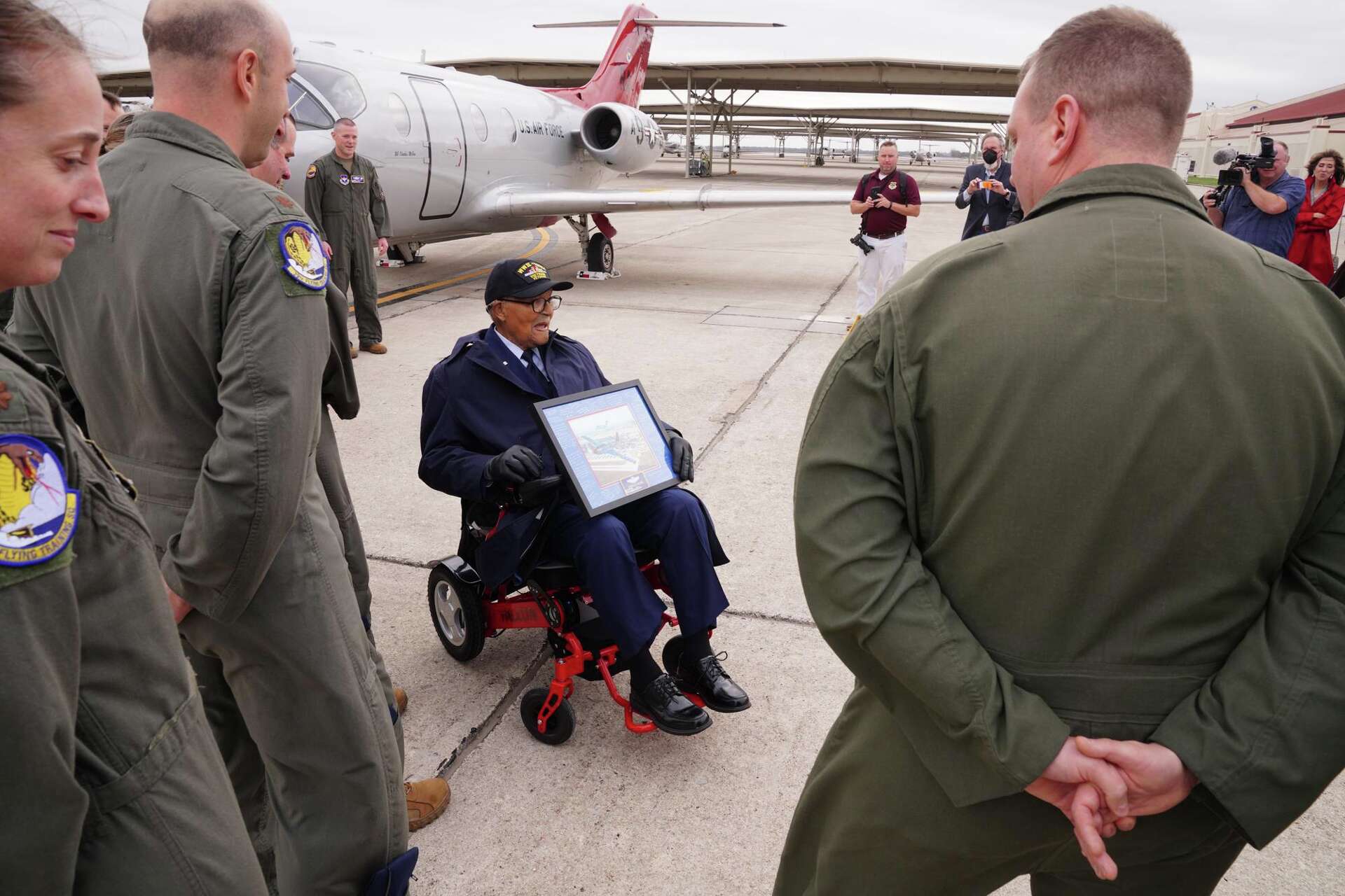 Day before turning 102, Tuskegee airman gets red carpet at Joint Base ...