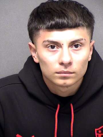 Teenager arrested in deadly shooting outside South Side bar