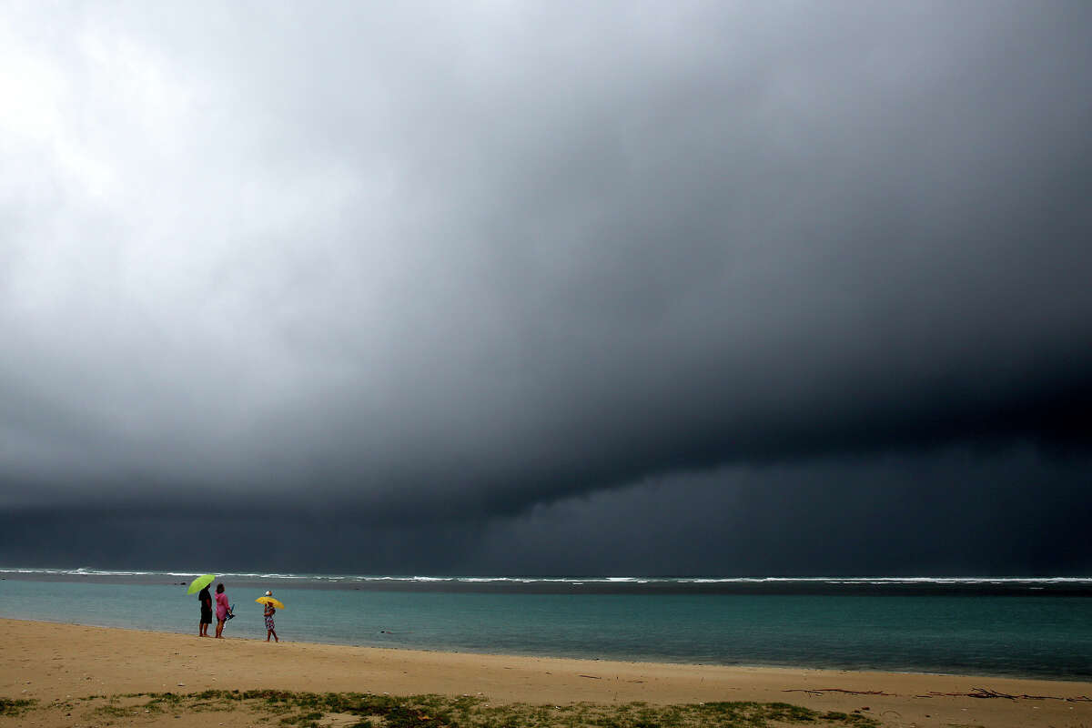 Hawaii storm breaks records and leaves behind trail of damage
