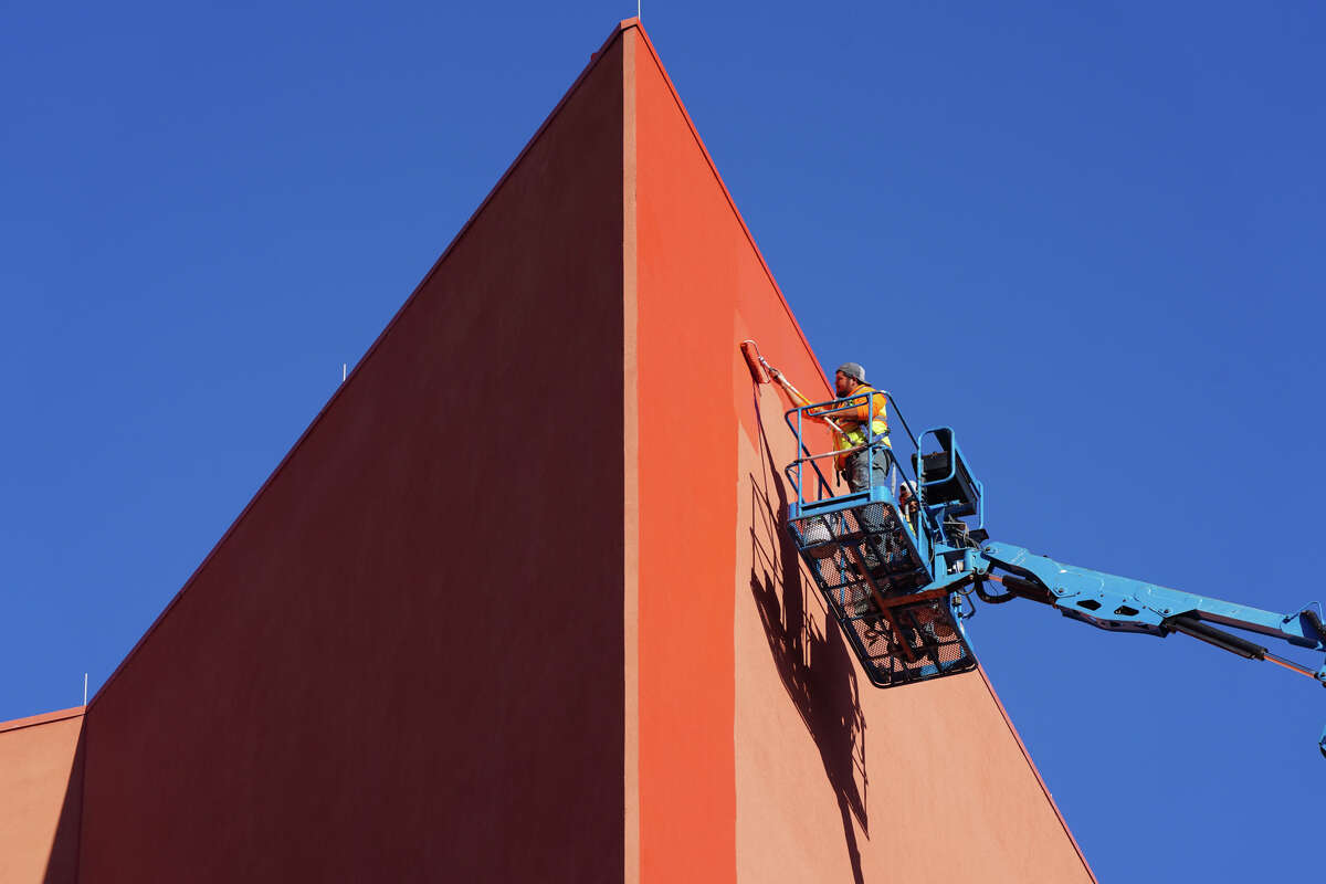 'Enchilada-red' Central Library's paint scheme fading under relentless ...