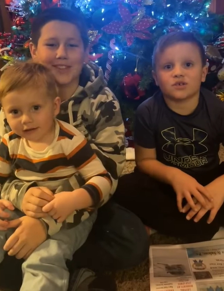 Three Bad Axe brothers entertain to promote veggie stand