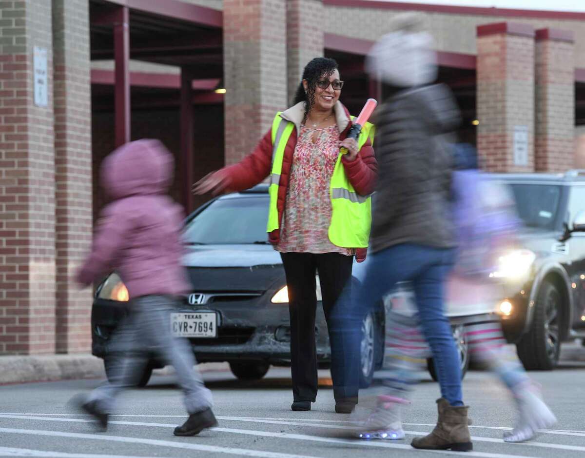 ‘She’s like an auntie’: Northeast Side crossing guard uses music to ...
