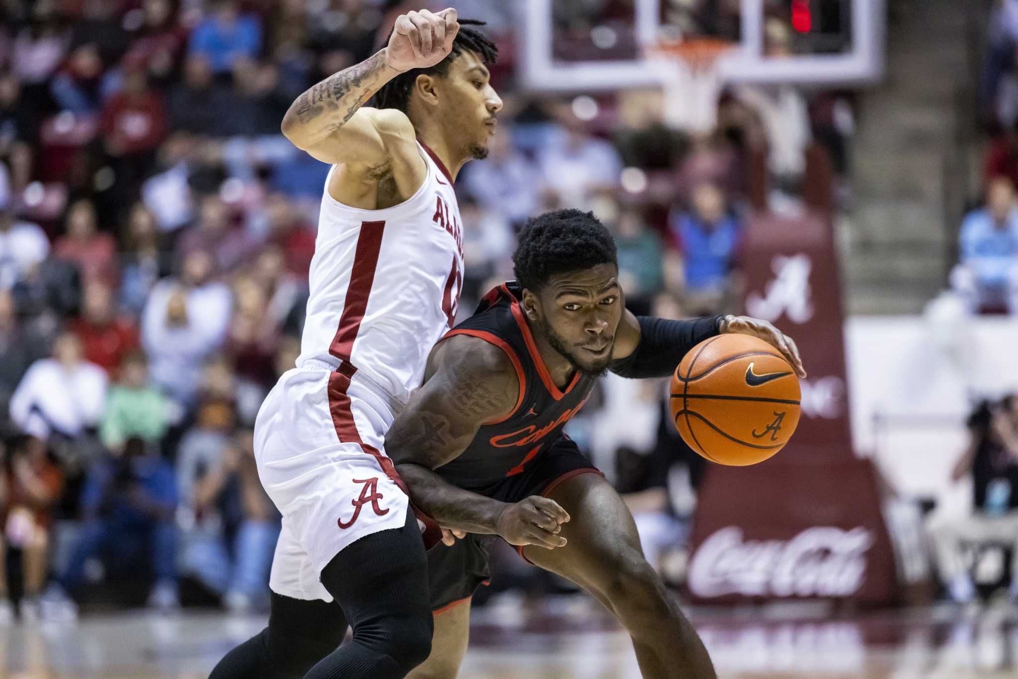 UH's Jamal Shead goes viral for picking up trash left by teammates ...