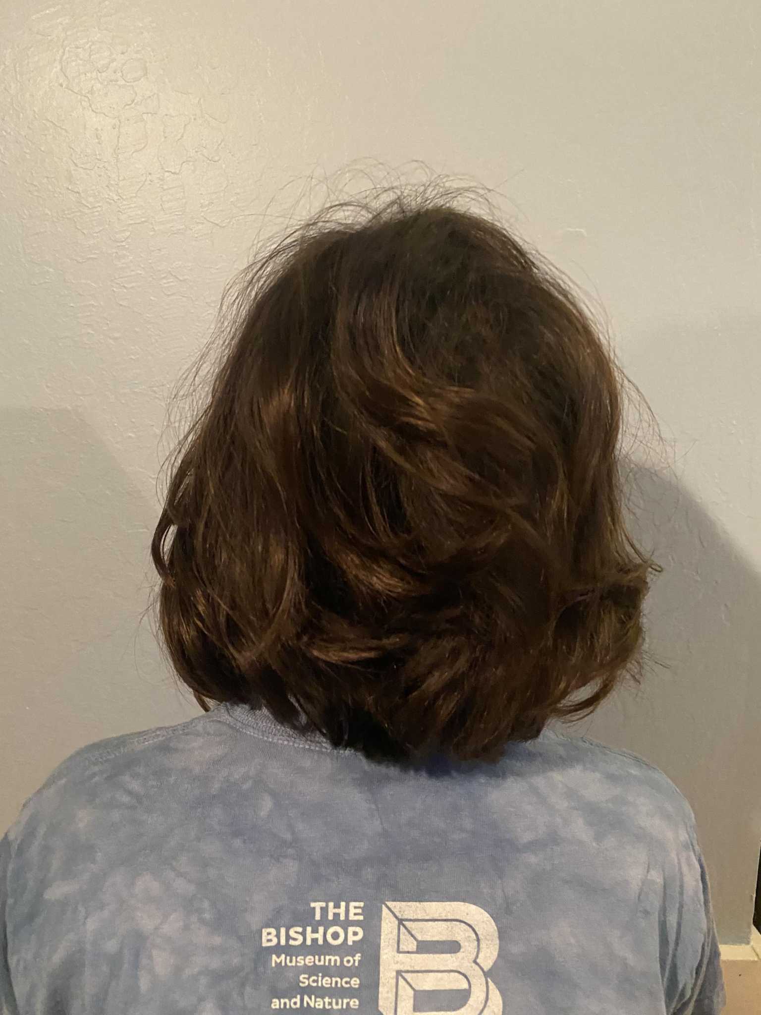 Amid a stubborn pandemic, a simple haircut offers a moment of hope