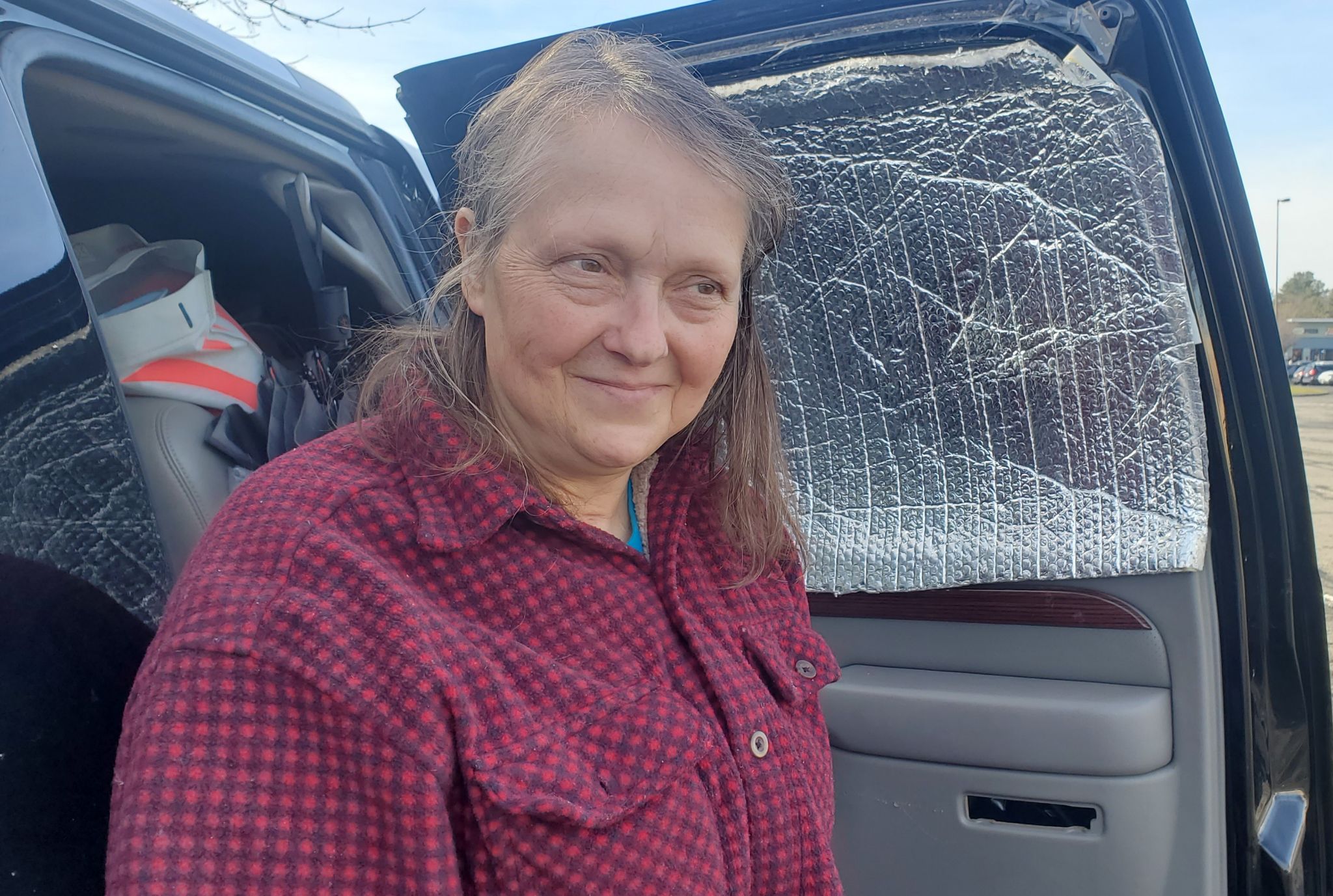 Churchill: One year later, parking lot is still her home