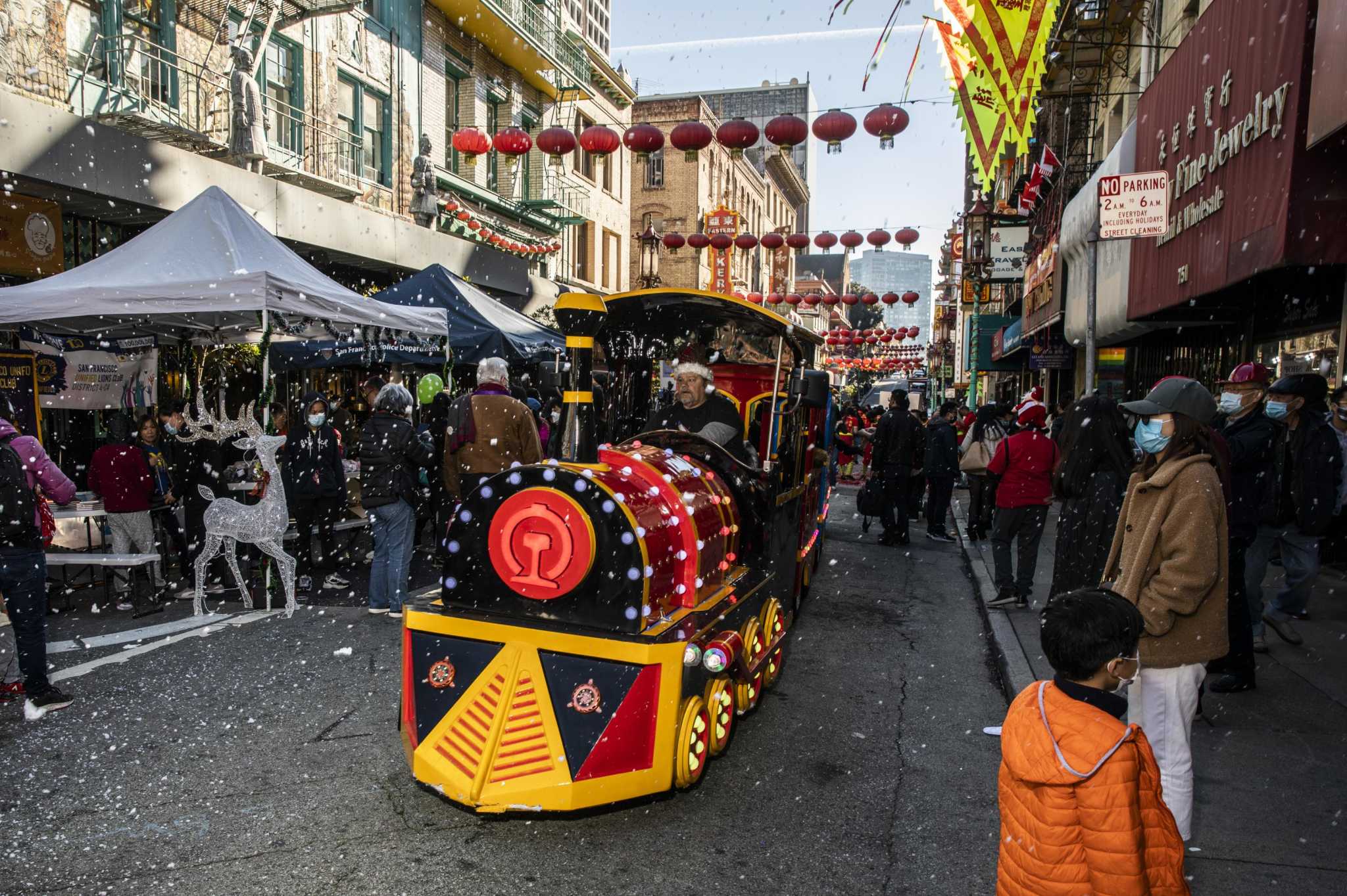 Christmas in Chinatown: Fake snow, Chinese lanterns, COVID vaccinations