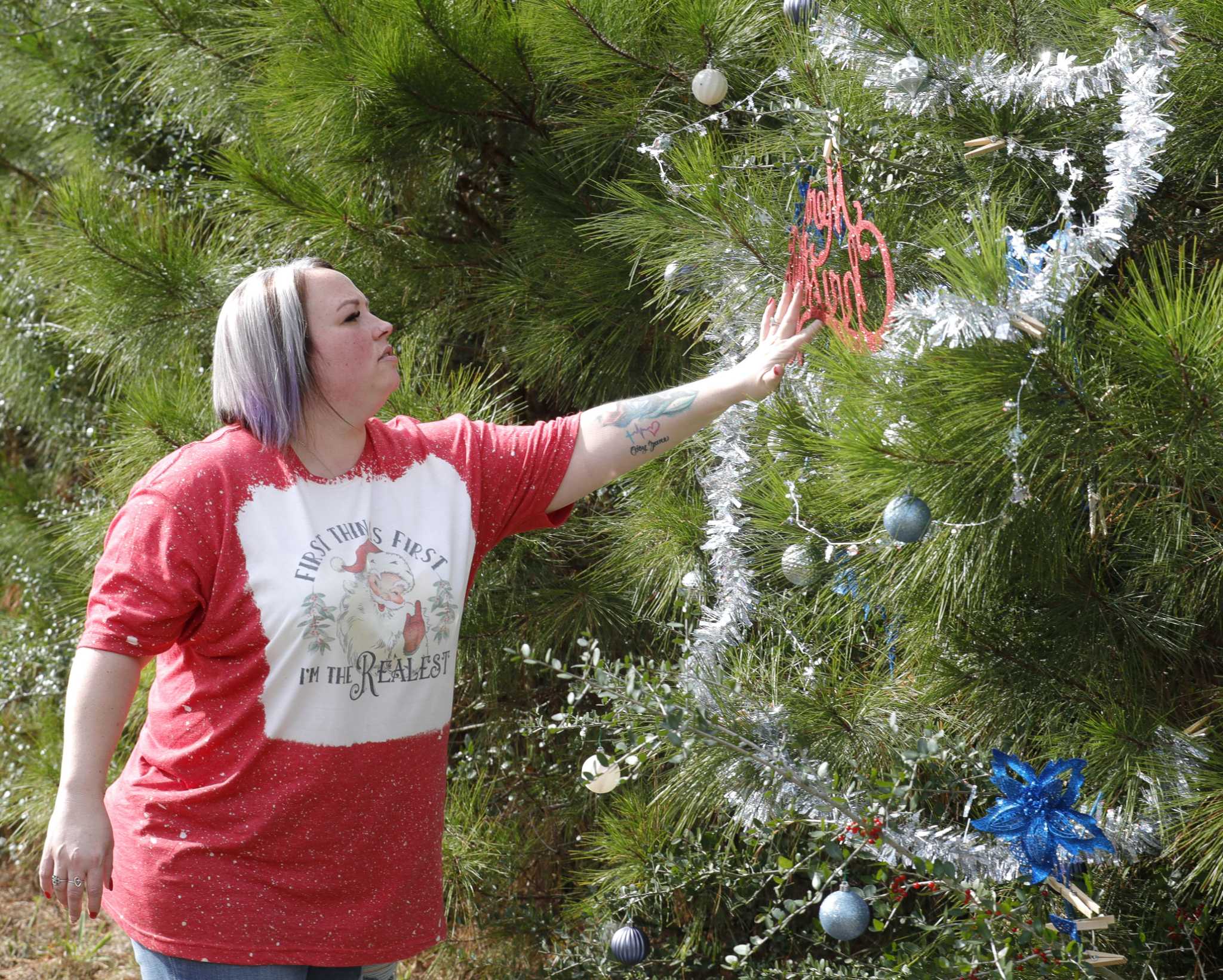 Roadside holiday decorations bring smiles to FM 1484 motorists