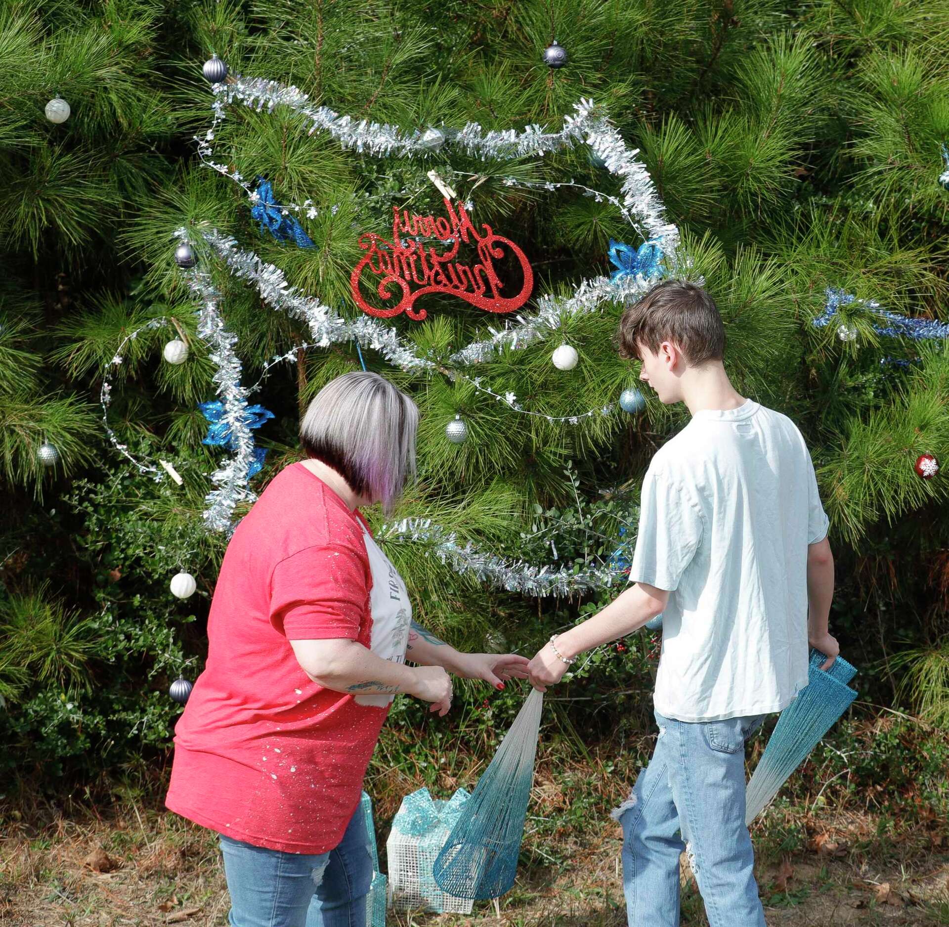 Roadside holiday decorations bring smiles to FM 1484 motorists