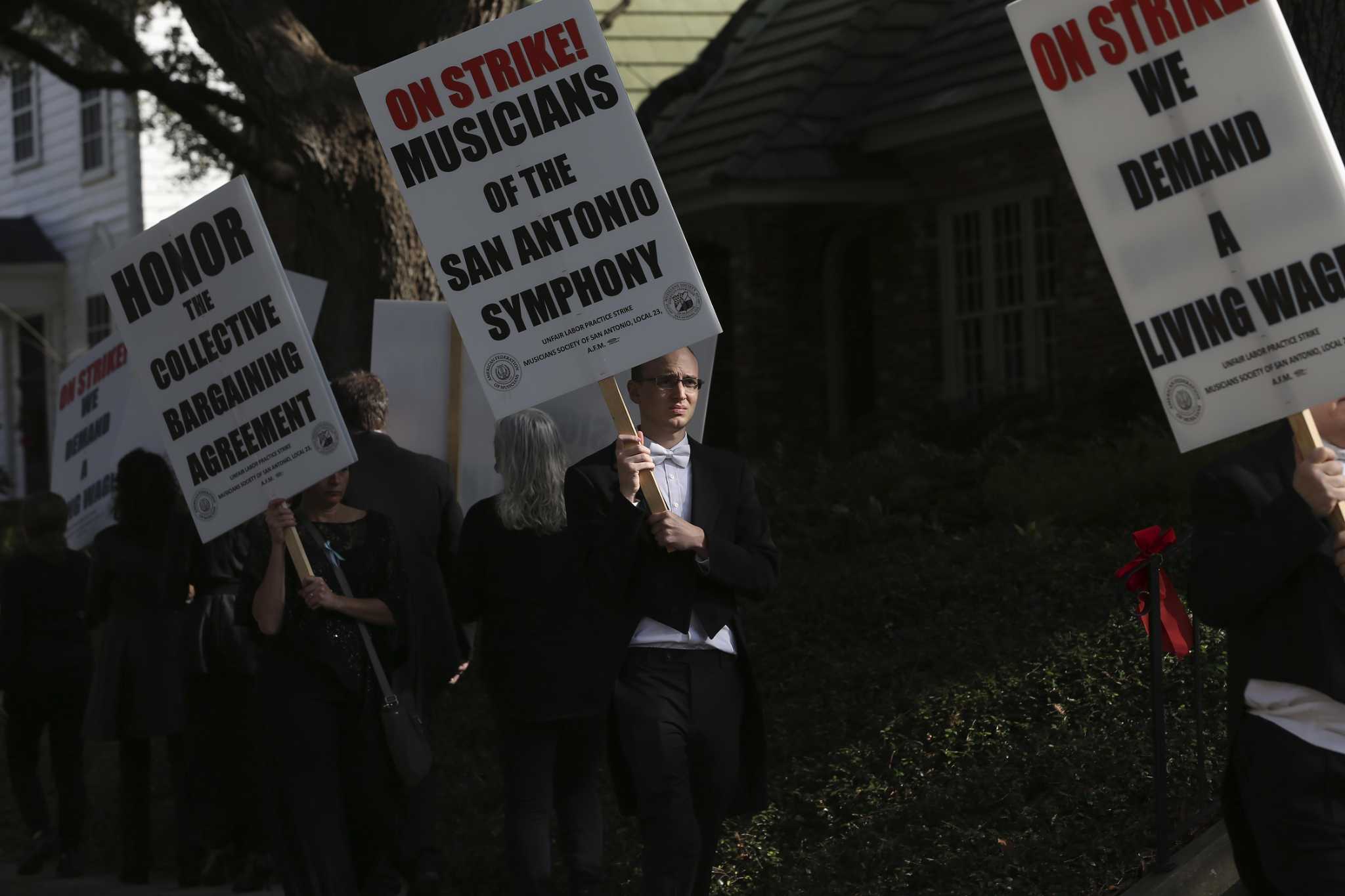 Eyeing better labor contract, musicians in full concert attire picket ...