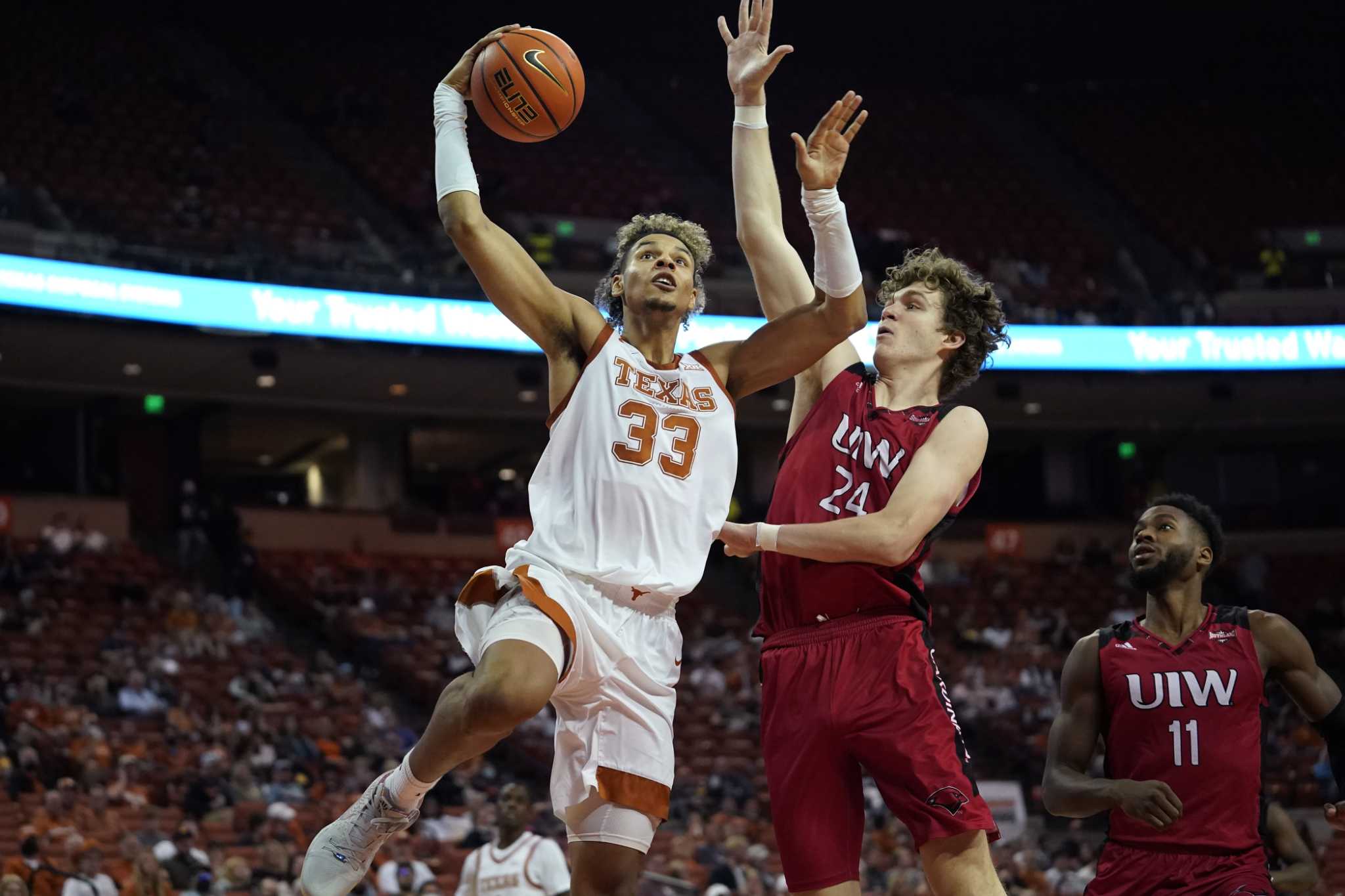 After benching, Courtney Ramey back in Texas' rotation in rout of ...