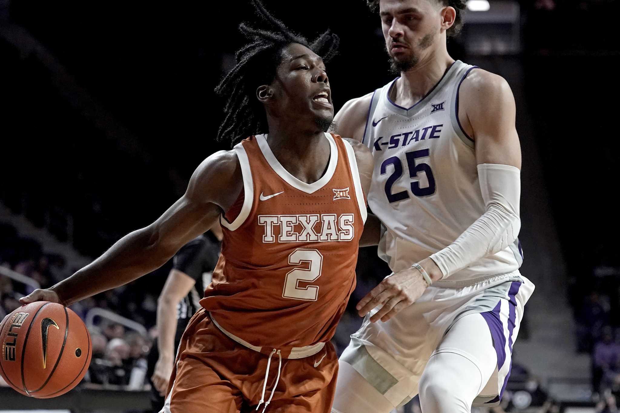 Texas rallies past short-handed Kansas State